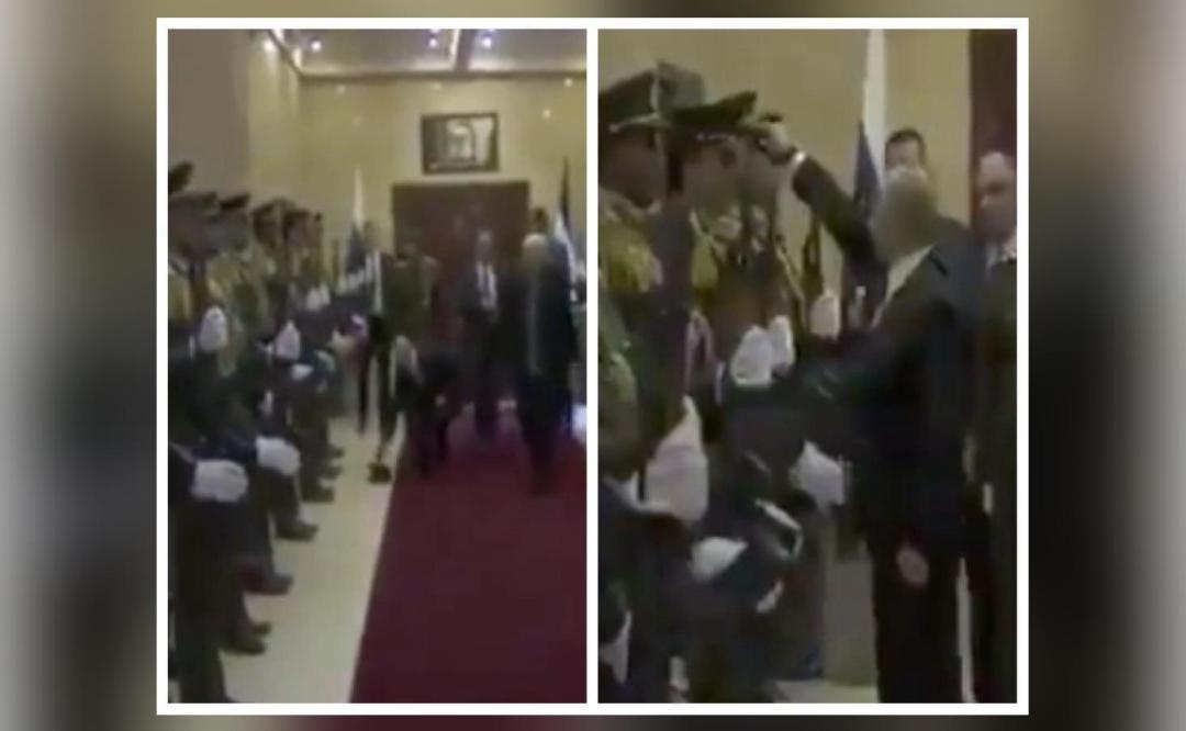 Putin puts fallen cap on head of honour guard member during Palestine ...