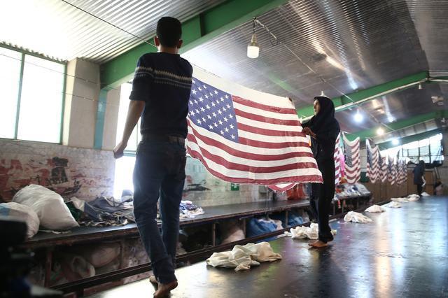 Iranian factory makes US, UK, Israel flags for protesters to burn