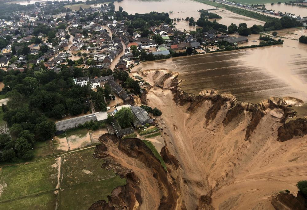 Massive sinkhole opens up in German village amid deadly floods; pic ...