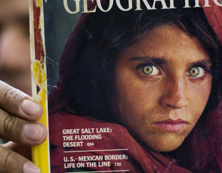 Afghan girl from famous magazine cover portrait evacuated to Italy ...