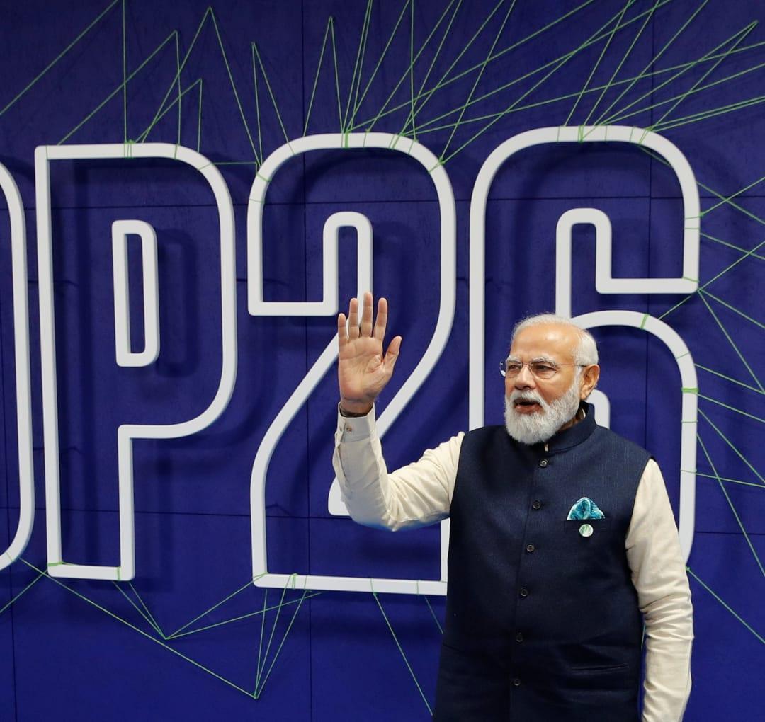 What commitments did India make at COP26 climate summit?
