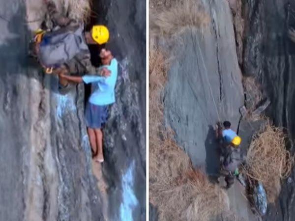 Drone video showing 23-year-old man's rescue from mountain in Kerala ...