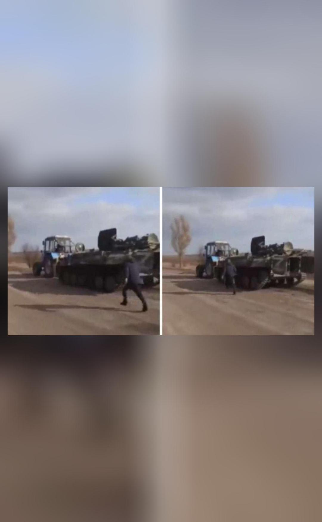 Video appears to show Ukraine farmer towing away Russian tank with ...