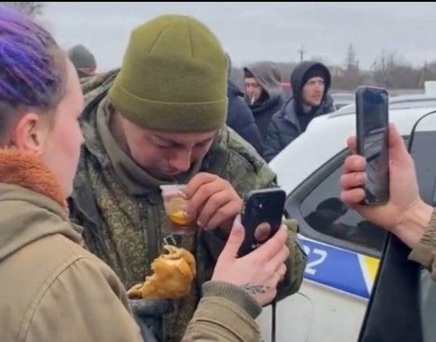 Video shows Russian soldier breaking down as Ukrainians give him tea ...