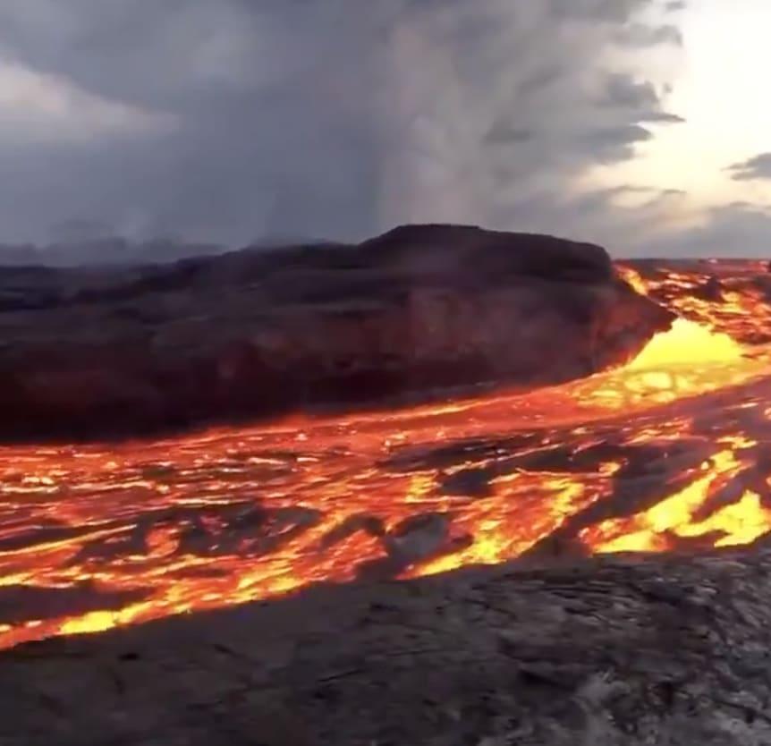 Close-up footage shows fast flowing river of lava rushing from volcano ...