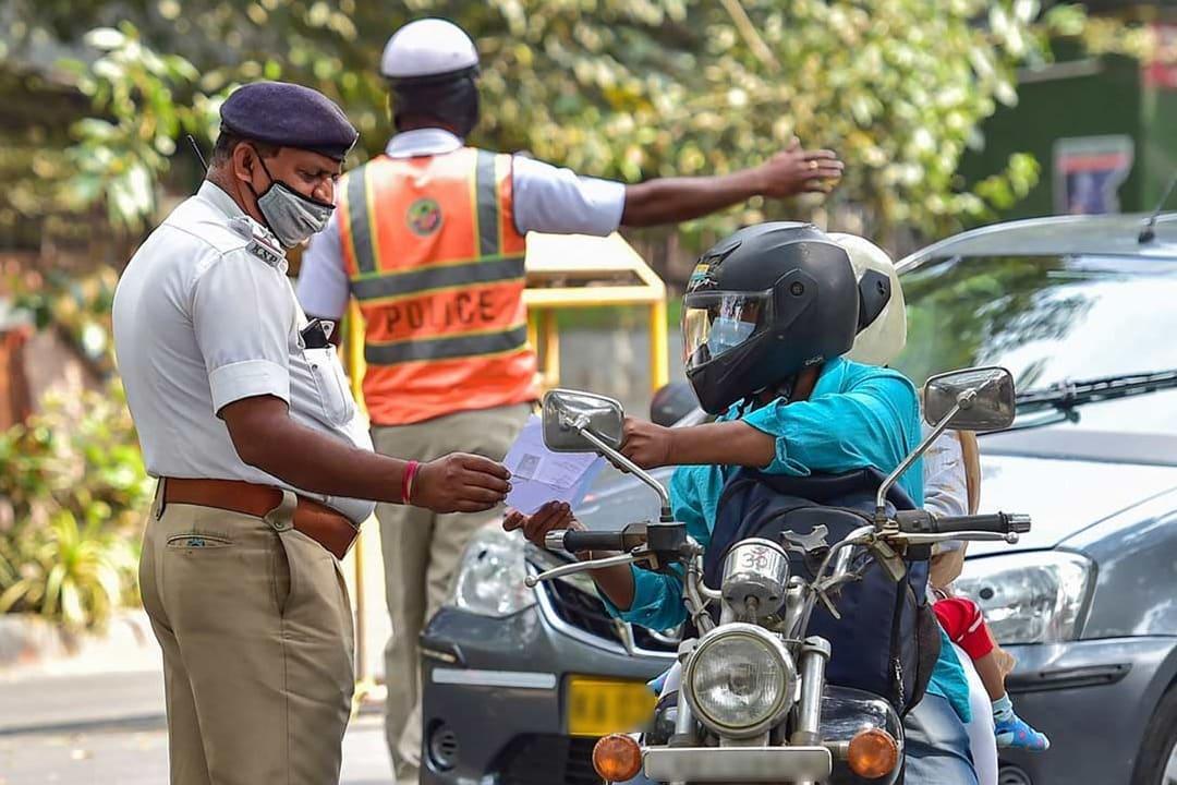 Fake policeman levies fines on violators with real policemen in Assam ...