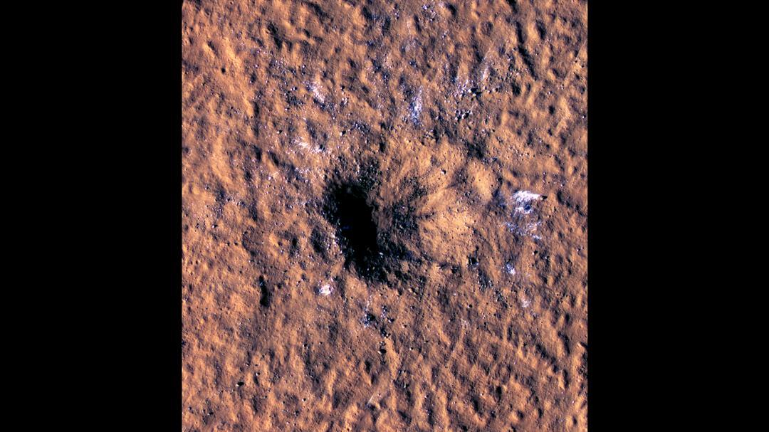 Pic shows 490 feet wide crater after meteoroid crashed into surface of Mars