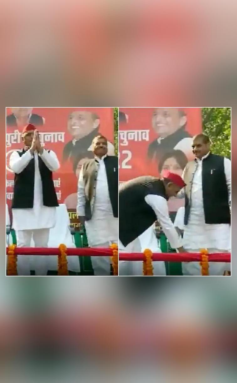 Akhilesh Yadav touches his uncle Shivpal's feet at poll rally in ... Akhilesh Yadav touches his uncle Shivpal's feet at poll rally in ...