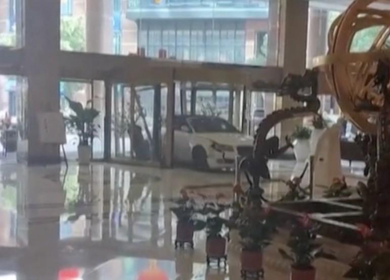 Angry guest smashes sports car into hotel lobby, drives around in China ...