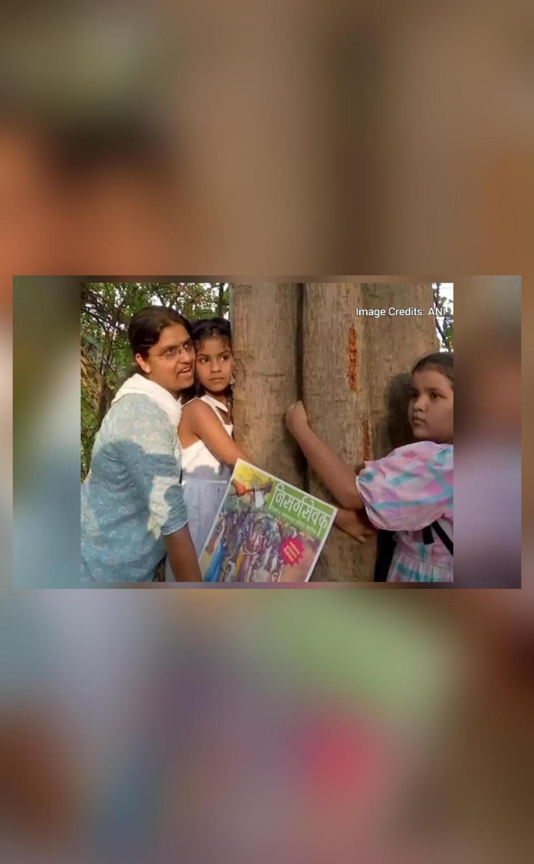 Hundreds Hug Trees To Protest Against Riverfront Project In Pune hundreds-hug-trees-to-protest-against-riverfront-project-in-pune