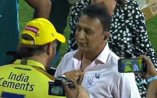 MS Dhoni signs autograph on Gavaskar's shirt after he runs towards him ...