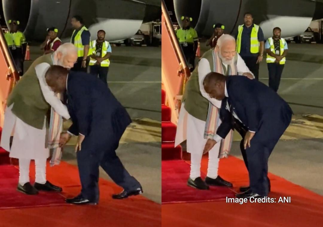 Papua New Guinea PM James Marape touches PM Modi's feet, video goes viral | World News | Inshorts
