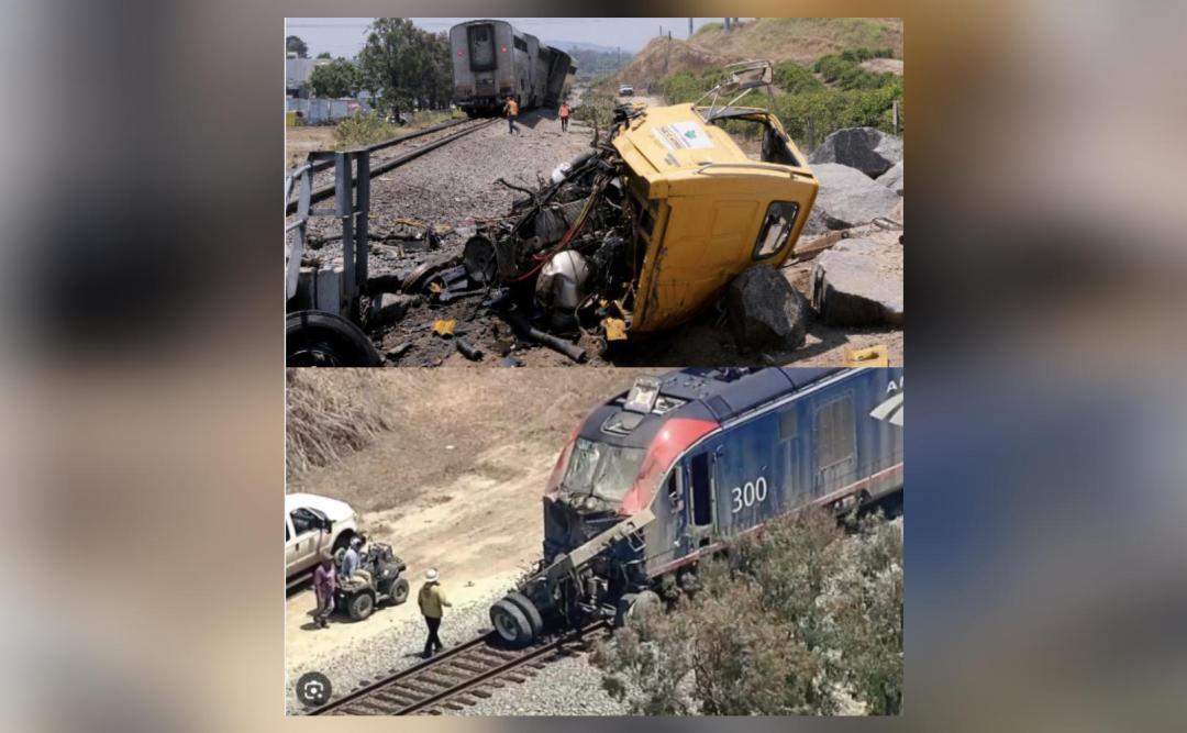 Train with 198 passengers derails after hitting truck in US