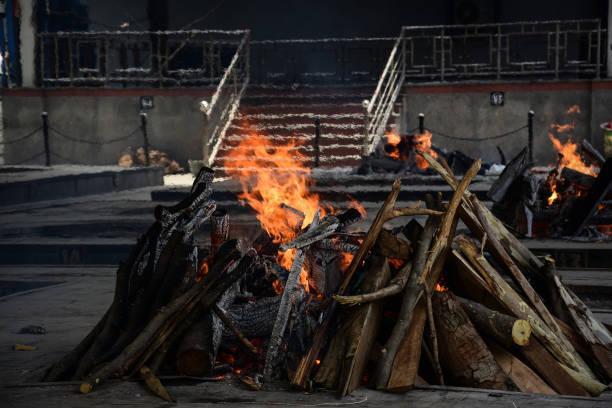 2 drunk men eat half-burnt dead body at cremation site in Odisha