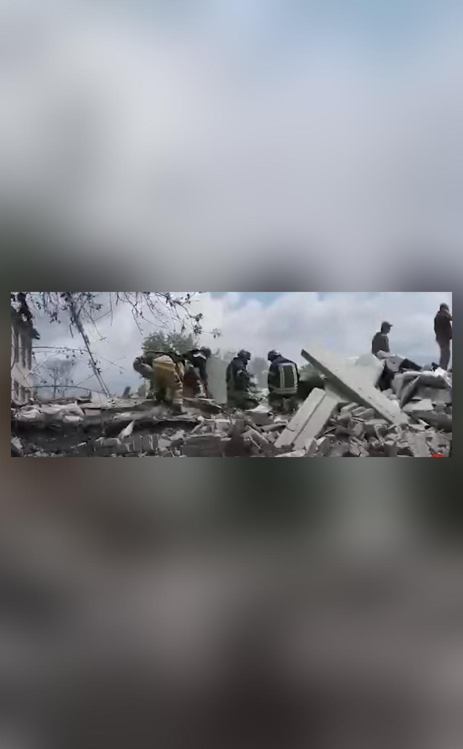 Rescuers dig through rubble as Russian strikes hit Ukraine school