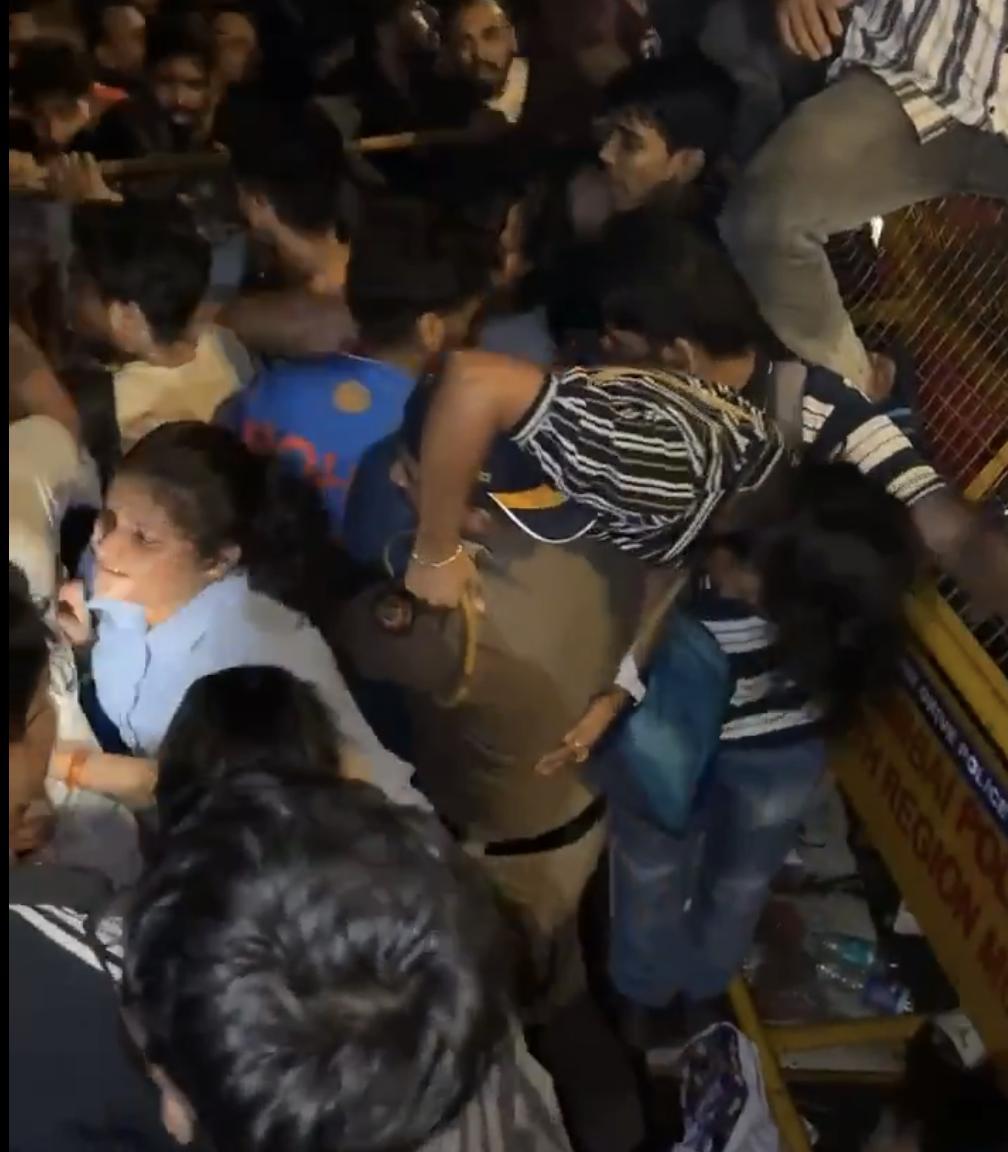 Video shows policeman carrying woman who fainted during Team India's ...